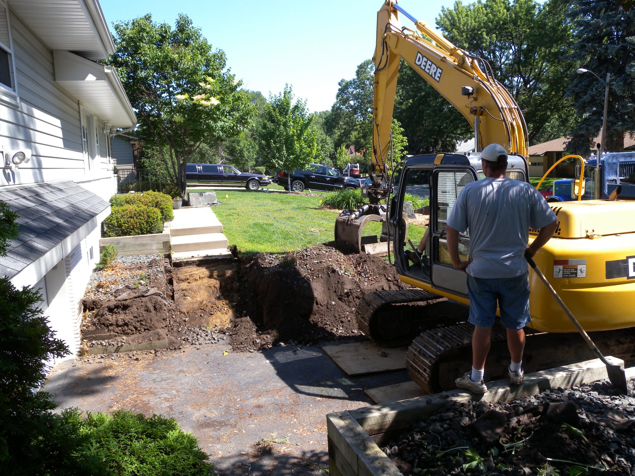 Landscape designs; boulder retaining wall About Us - Boulder Images Inc.